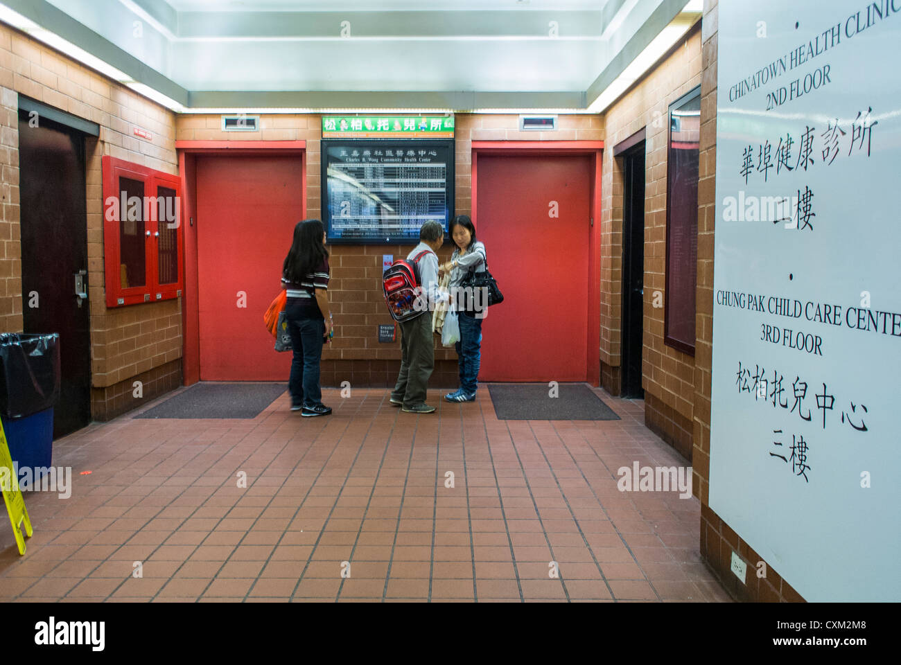 New York, Chinese Family in Hallway of Chinese Healthcare Center in ...