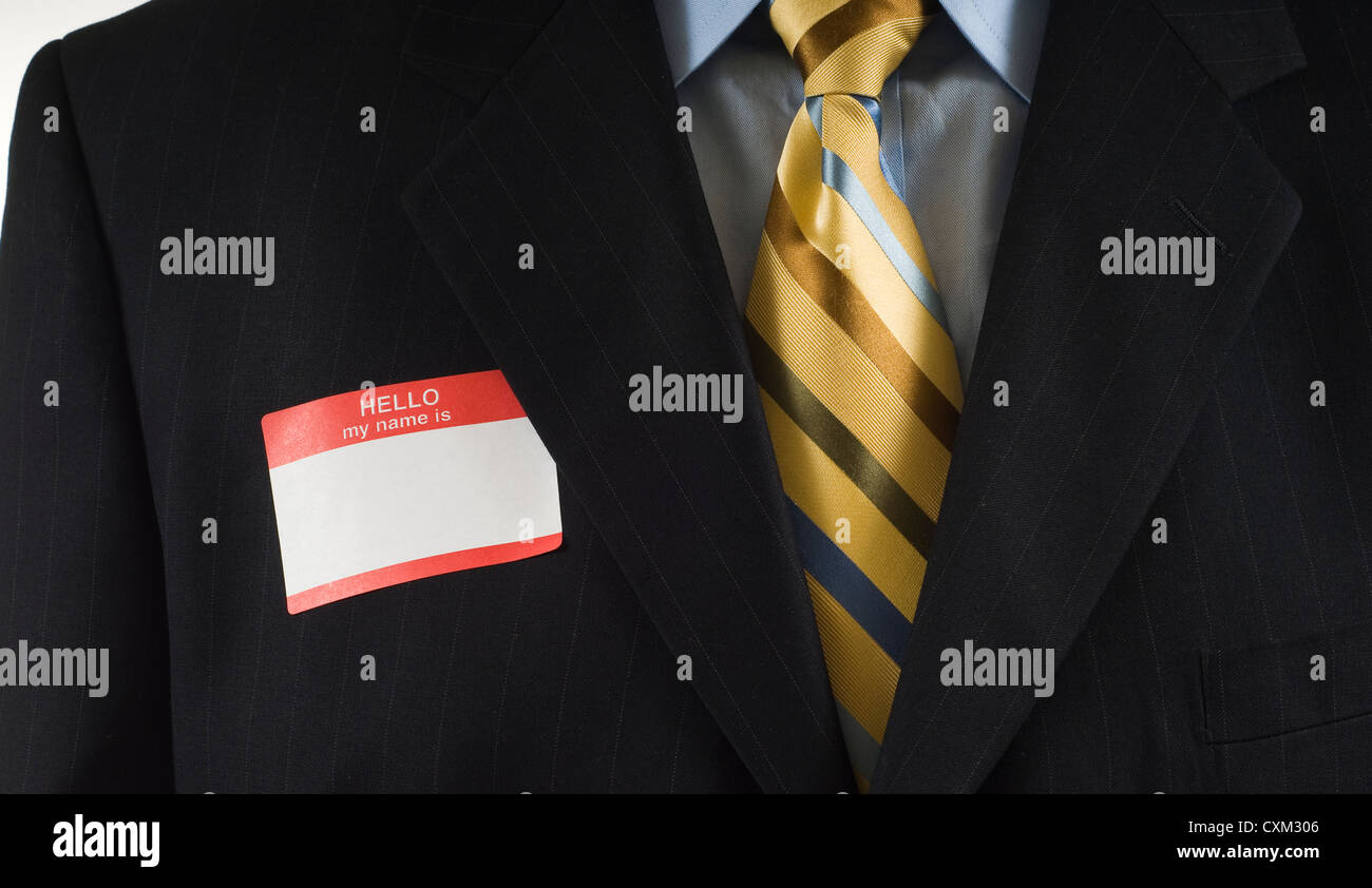 Business man in blue suit with name tag, insert your own text etc Stock ...