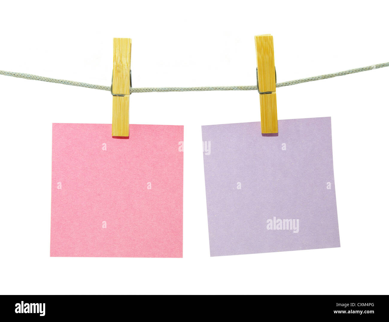 note paper blanks on rope isolated on white Stock Photo - Alamy