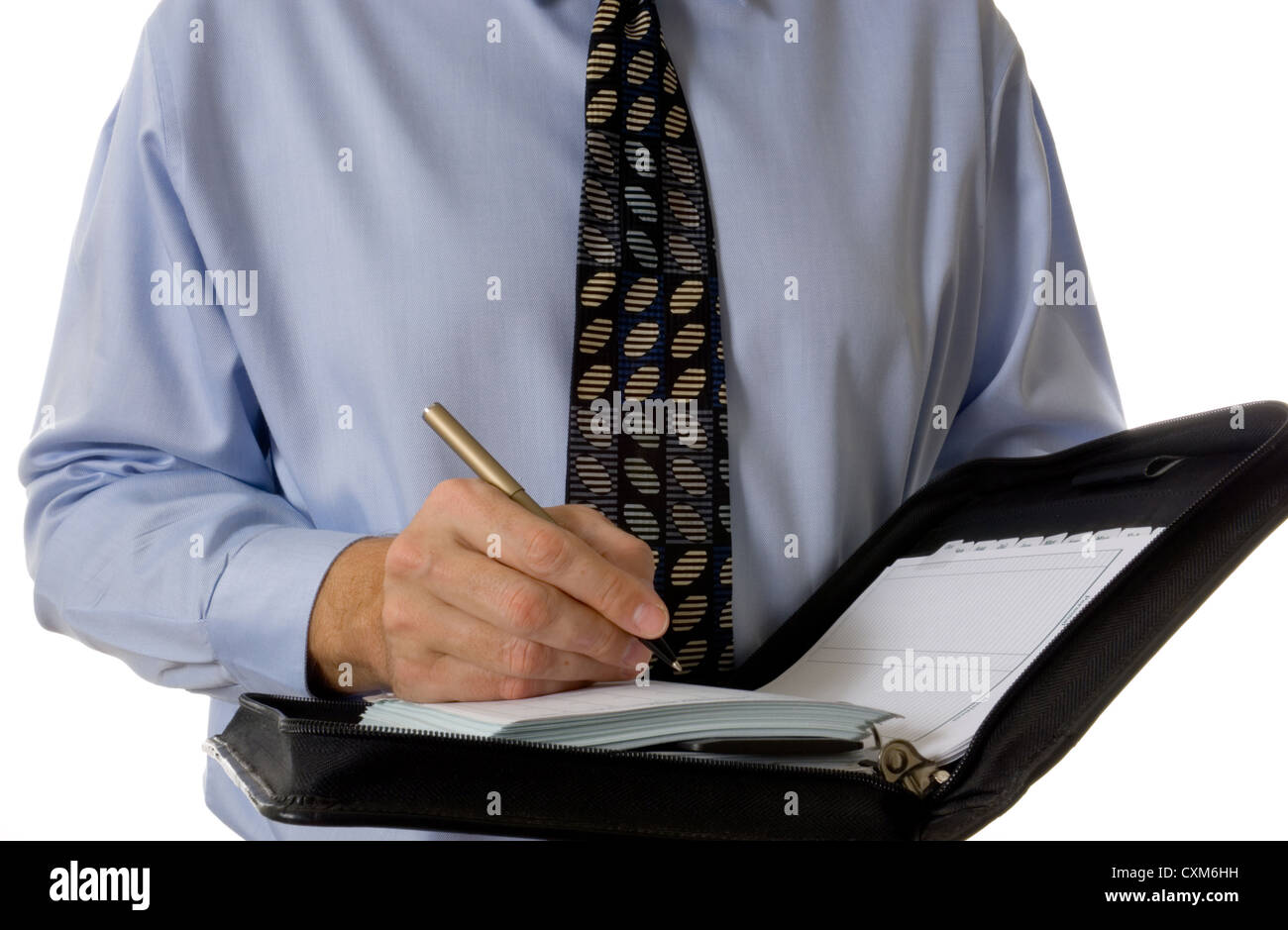 Business man writing, scheduling in paper organizer, calendar Stock ...
