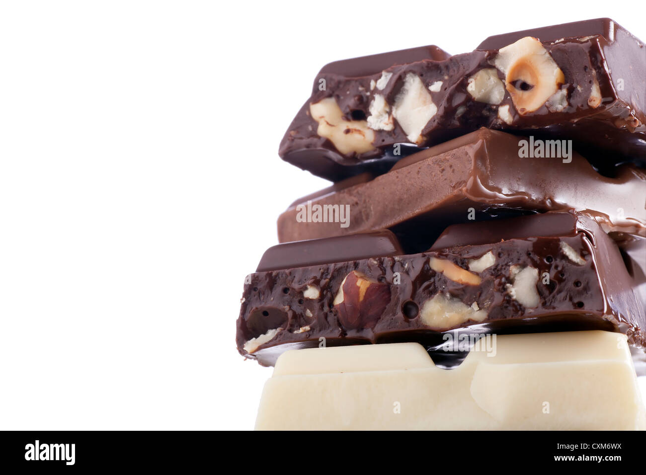 Milk chocolate, white chocolate and dark chocolate with nuts Stock ...