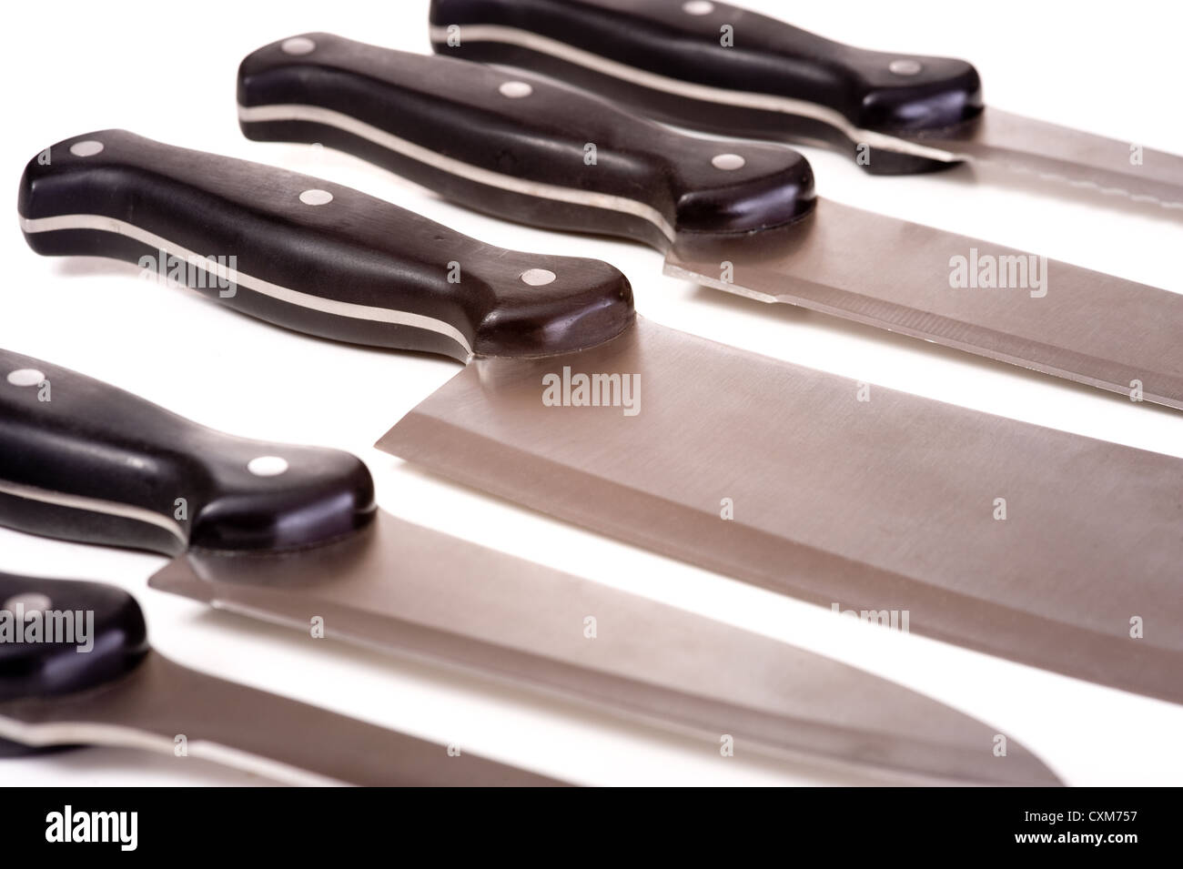 A set of professional chef's knives on a white background Stock Photo ...