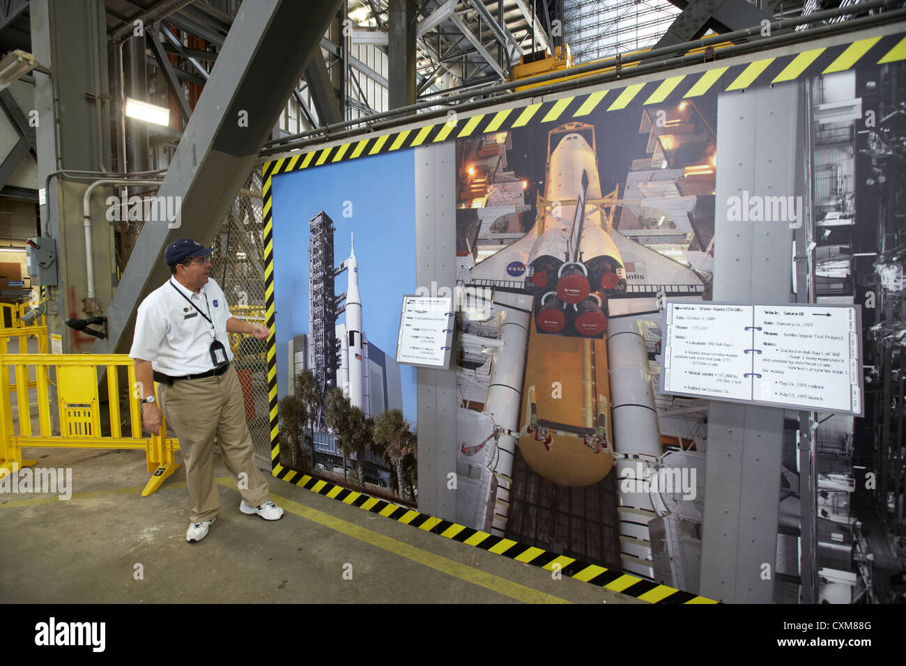nasa tour guide with display boards on guided tour of the interior of ...