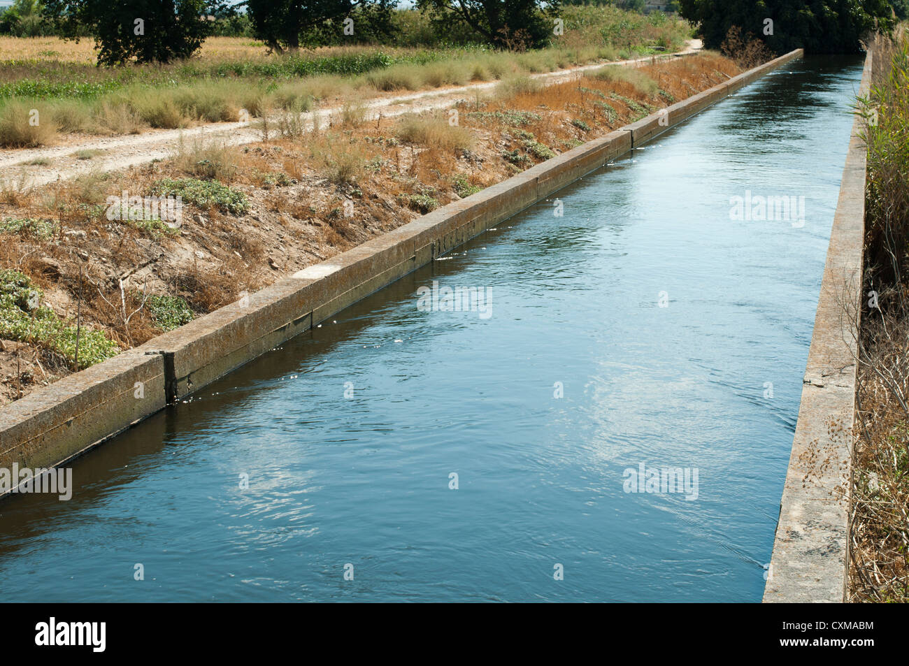 Irrigation canal in the field Stock Photo - Alamy