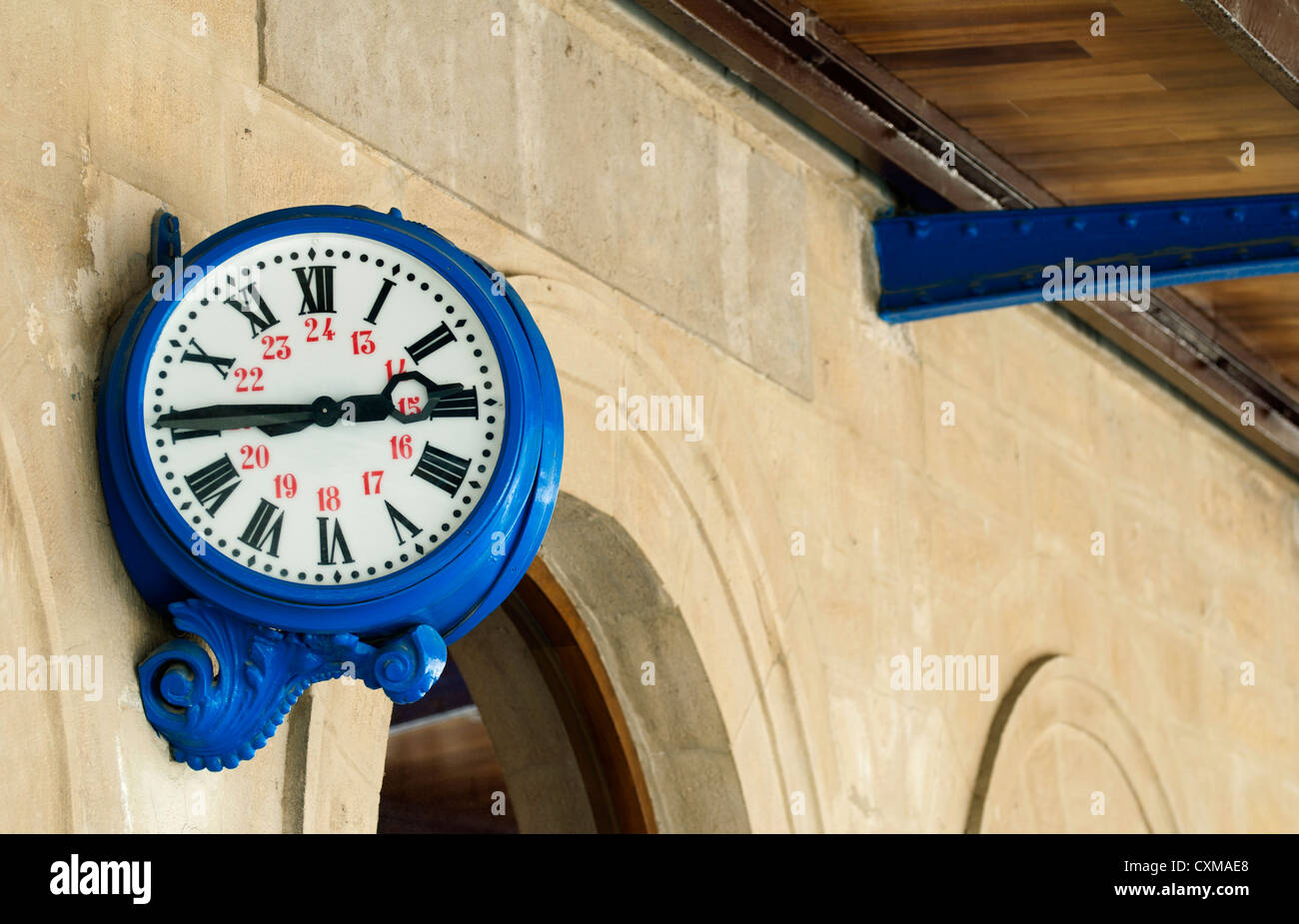 Antique external blue clock on railway station Stock Photo - Alamy