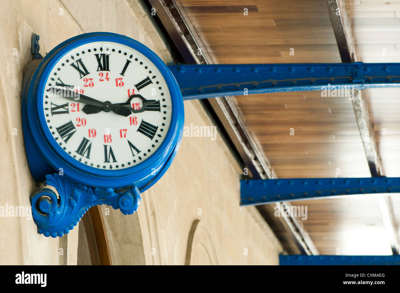 Antique external blue clock on railway station Stock Photo - Alamy