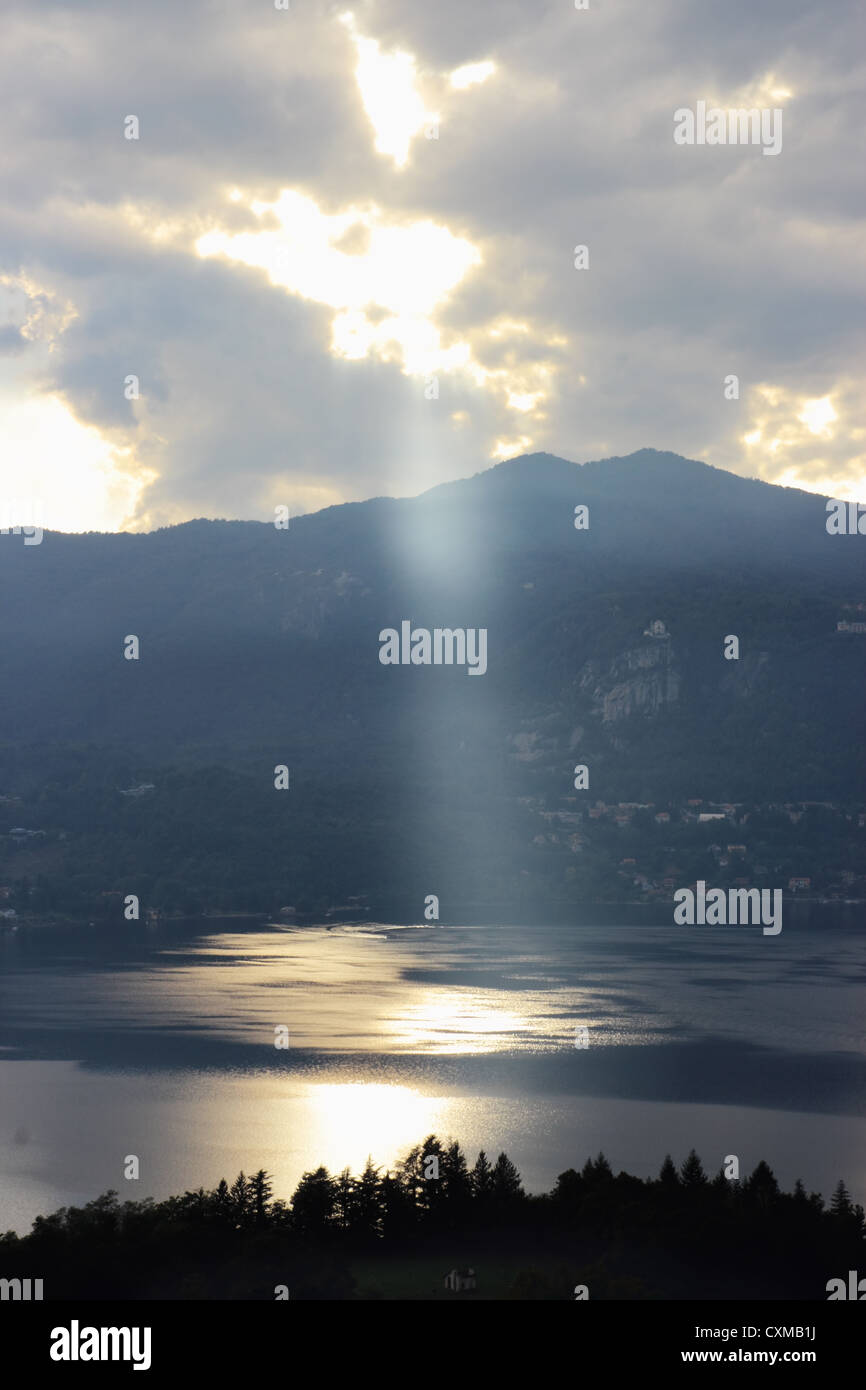 ray of sun light over Orta Lake, Italy Stock Photo - Alamy