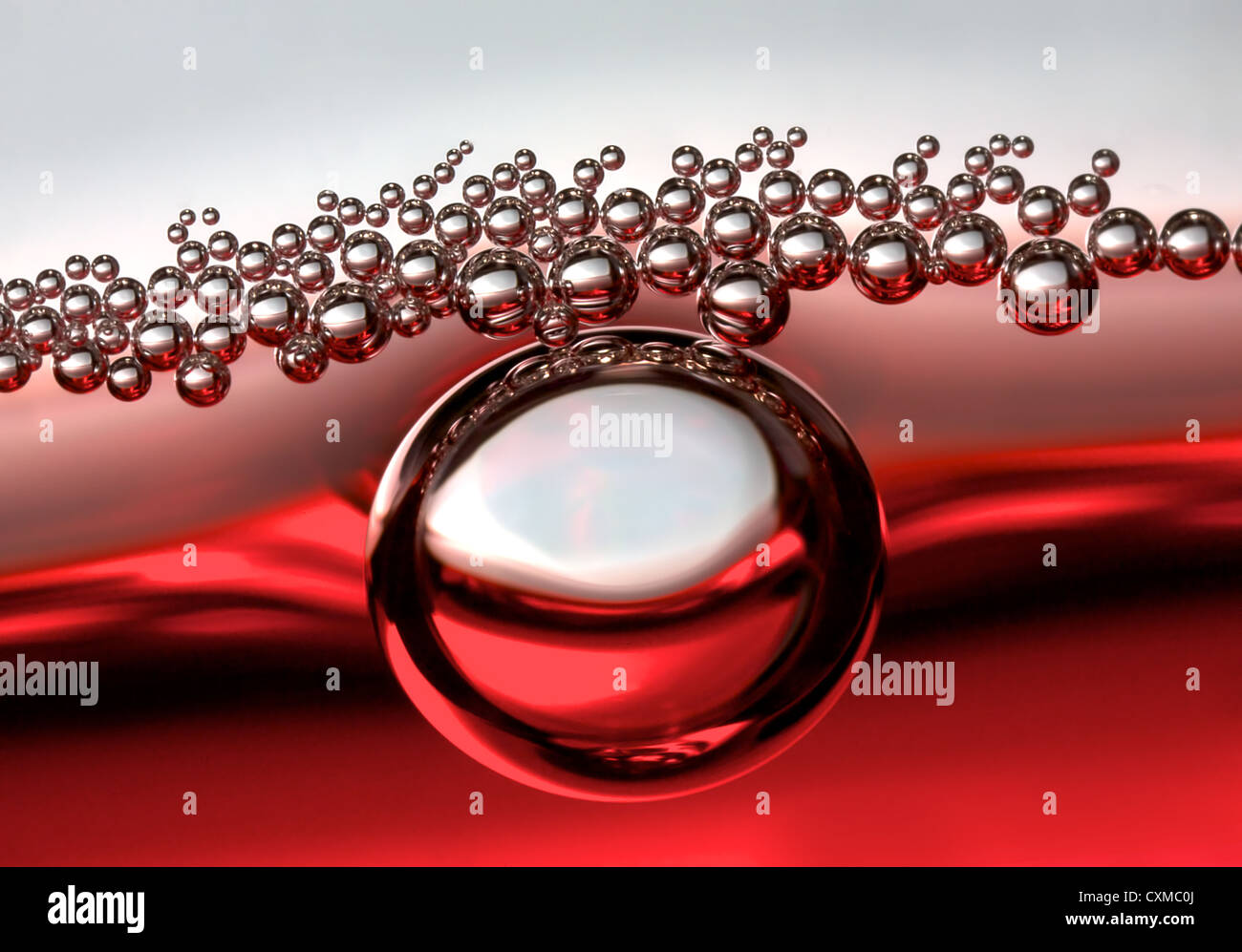 a single bubble followed by smaller bubbles Stock Photo - Alamy