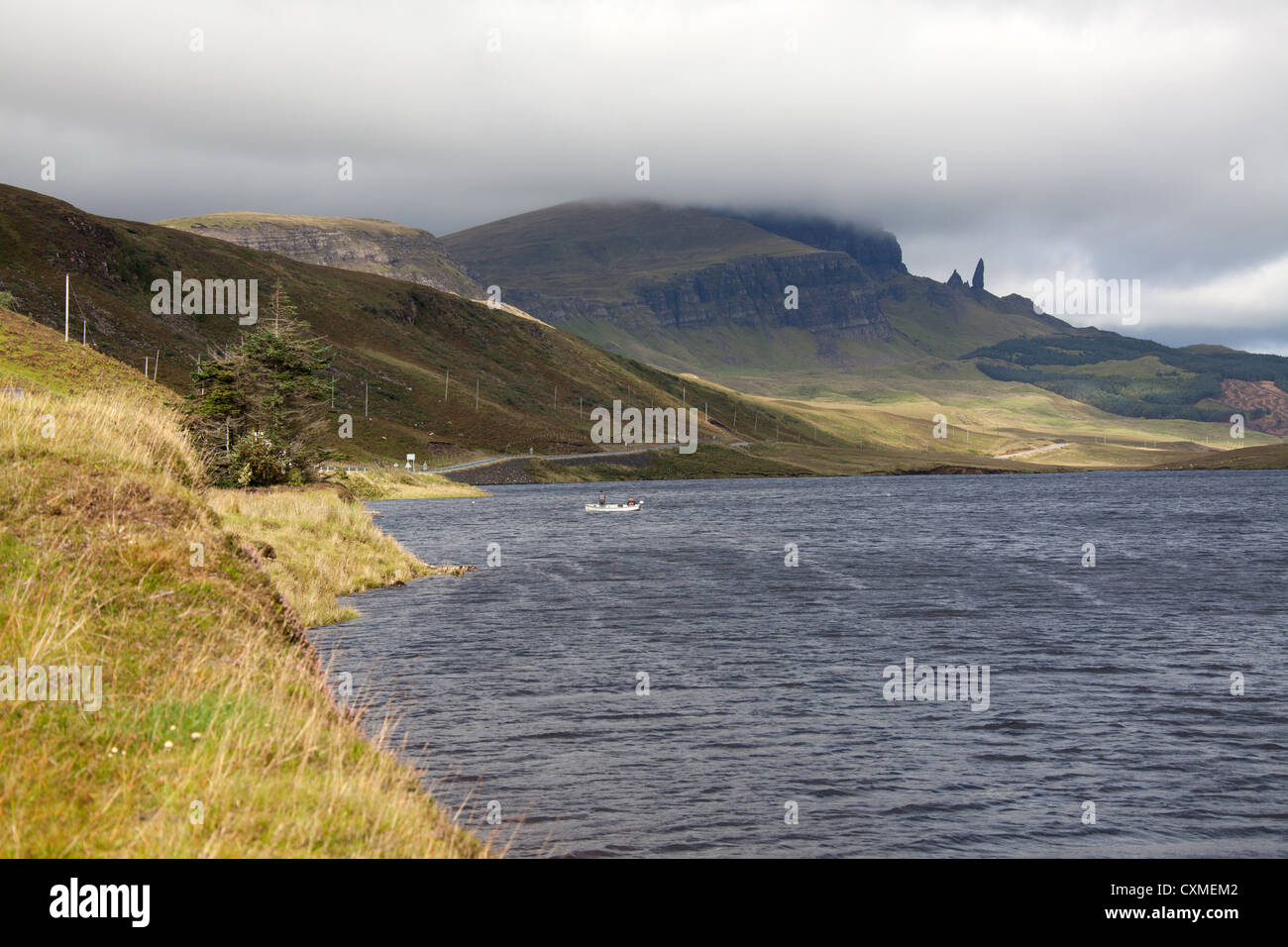 Isle of Skye, Scotland. Picturesque view of fishermen fly fishing on ...
