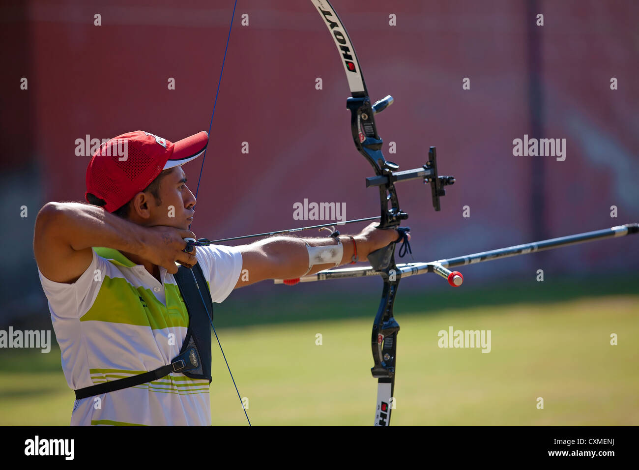 Sportsperson practicing archery Stock Photo - Alamy