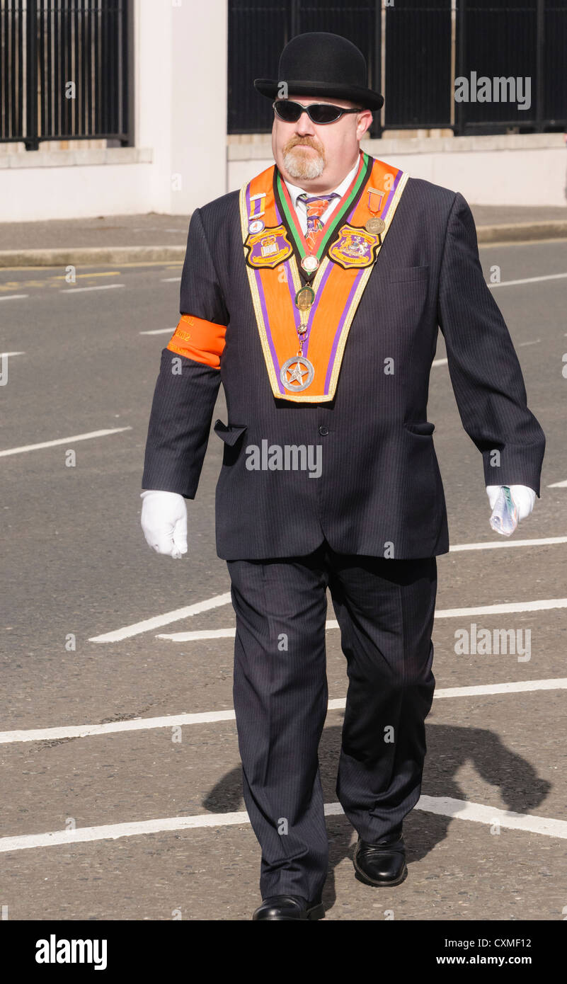 District Marshal orangeman wearing traditional 'Orange sash' and bowler ...