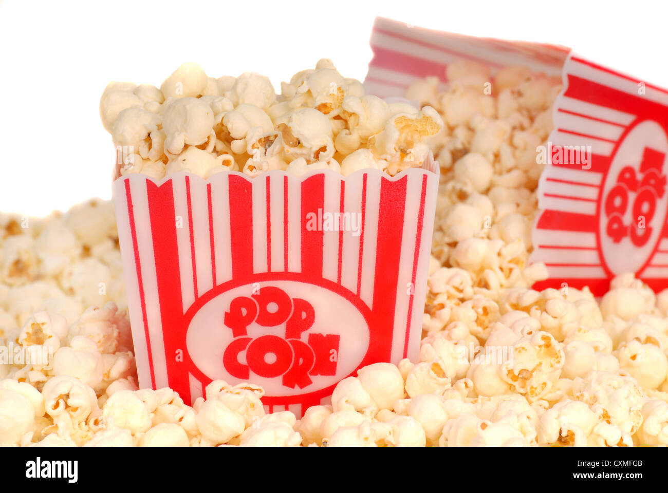 Two boxes of delicious movie popcorn with popcorn spilling out Stock ...