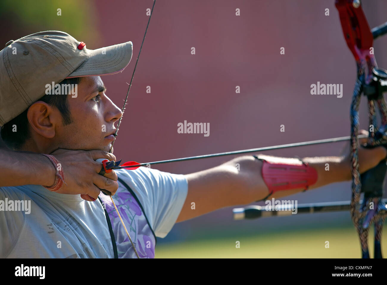 Sportsperson practicing archery Stock Photo - Alamy