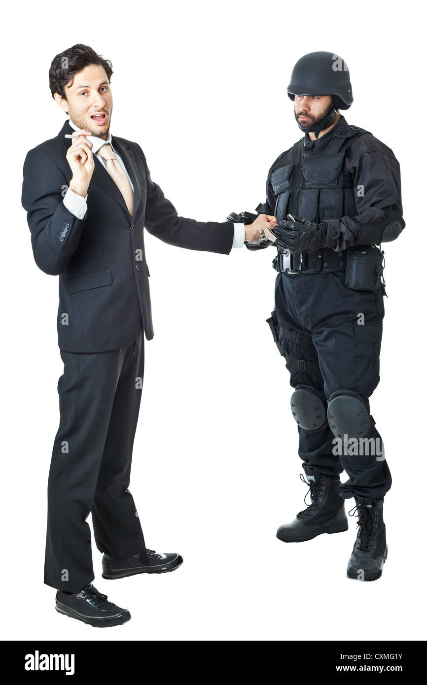 a corrupted businessman being arrested by a swat agent Stock Photo - Alamy