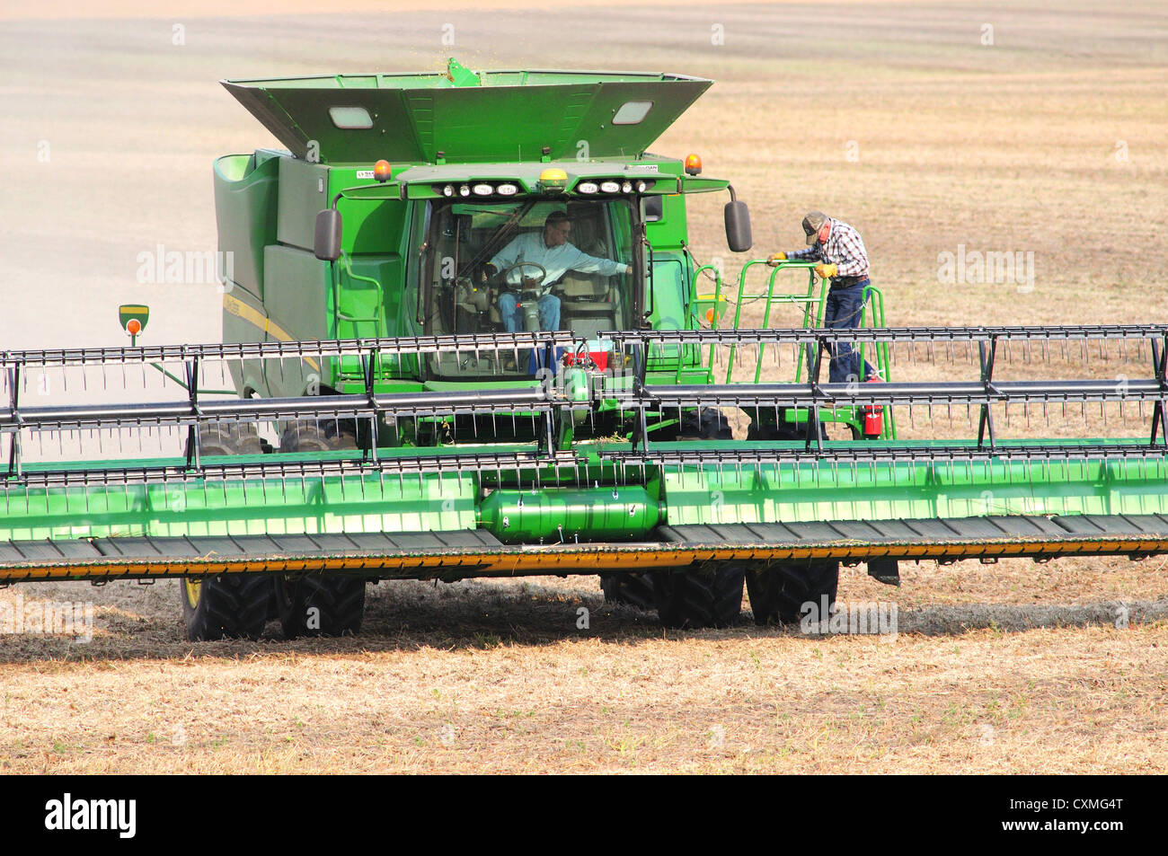 A John Deere combine harvesting soybeans Stock Photo - Alamy