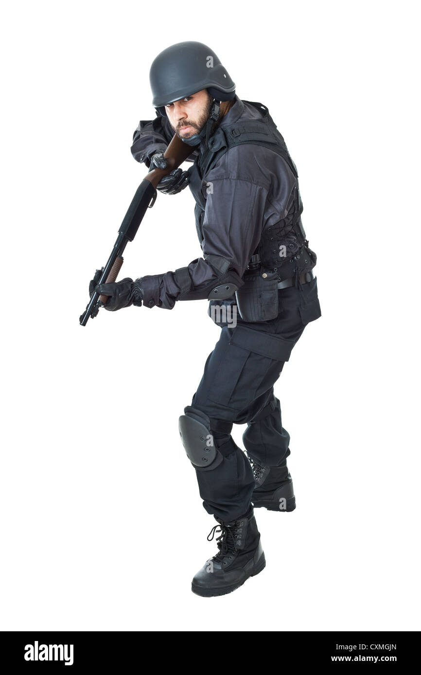 a swat agent wearing a bulletproof vest and aiming with a gun Stock ...