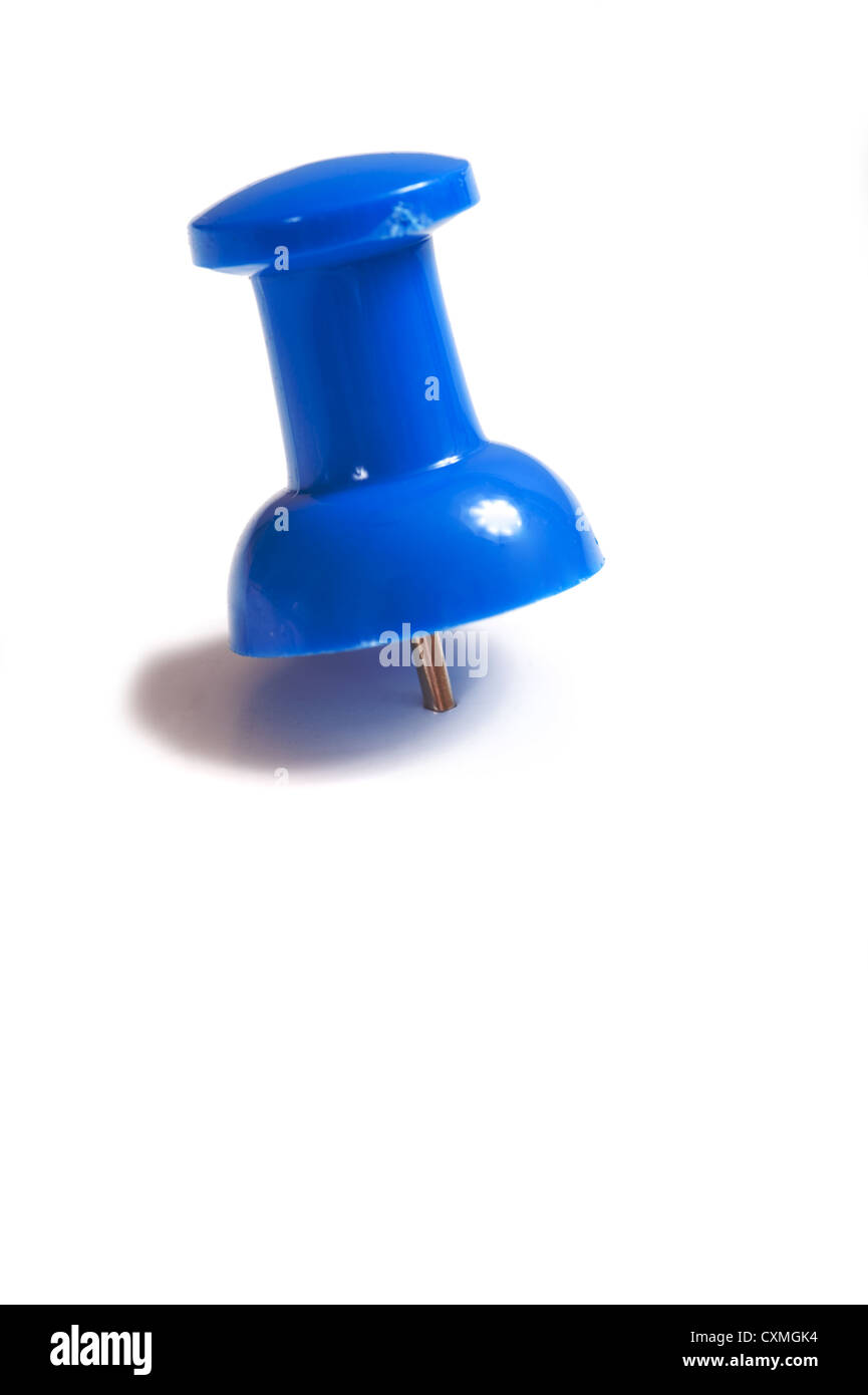 A blue stick pin on a white background with copy space Stock Photo - Alamy
