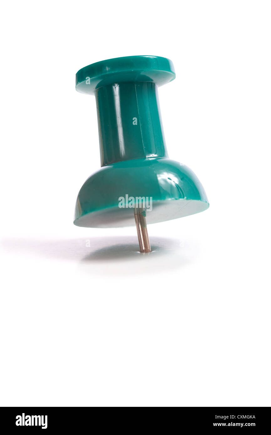 A green stick pin on a white background with copy space Stock Photo - Alamy