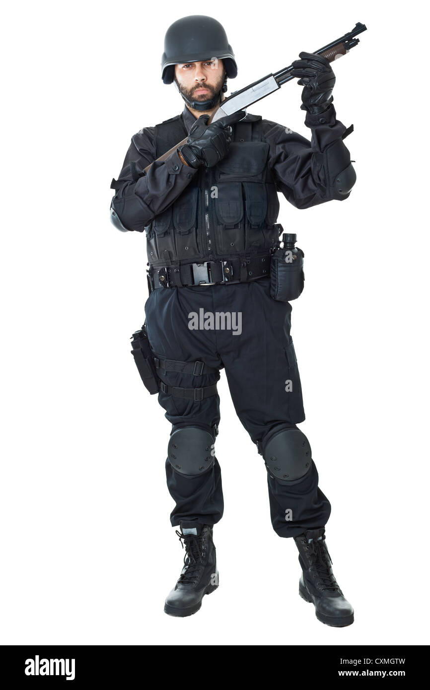 a swat agent wearing a bulletproof vest and aiming with a gun Stock ...