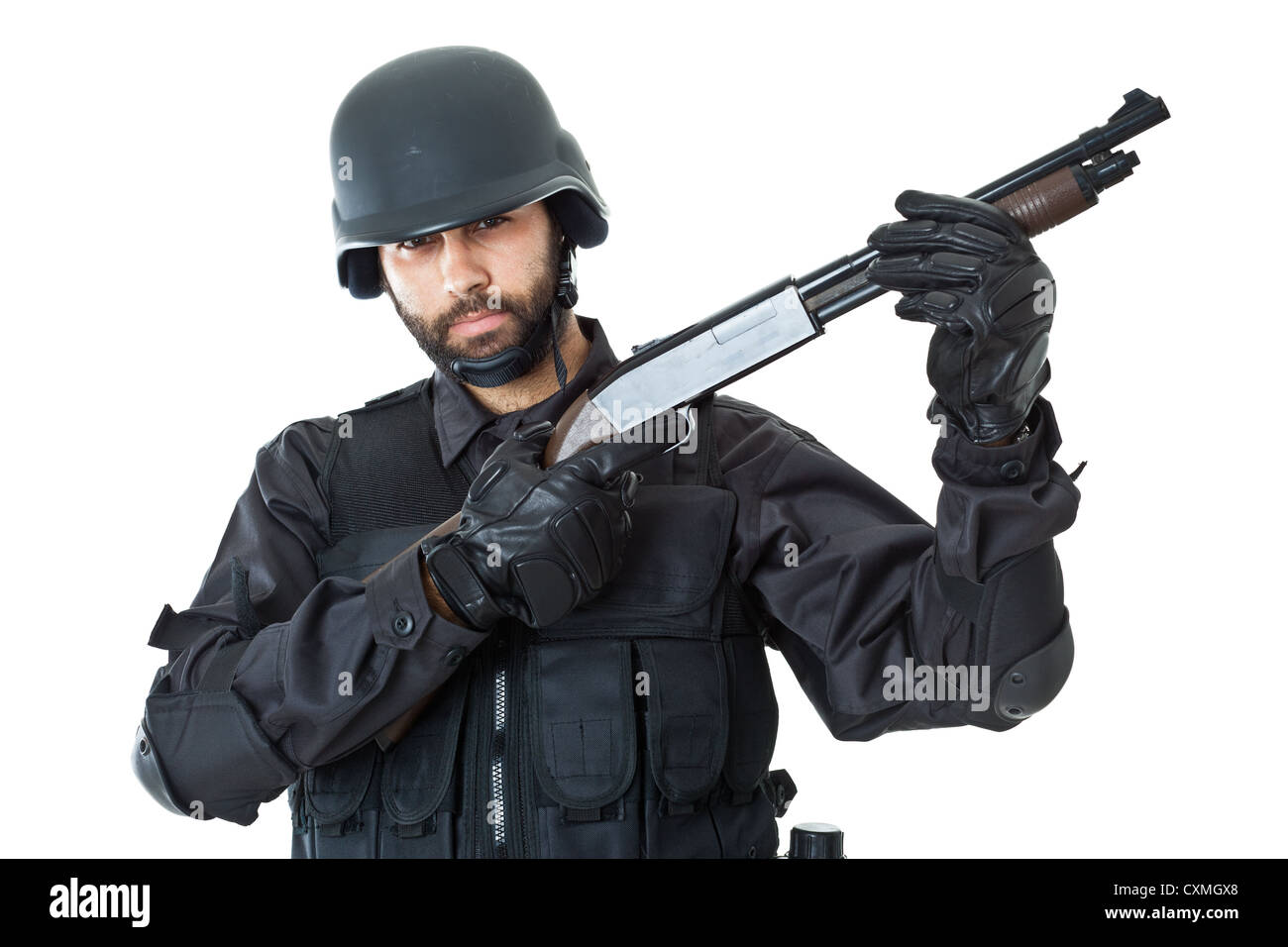 a swat agent wearing a bulletproof vest and aiming with a gun Stock ...