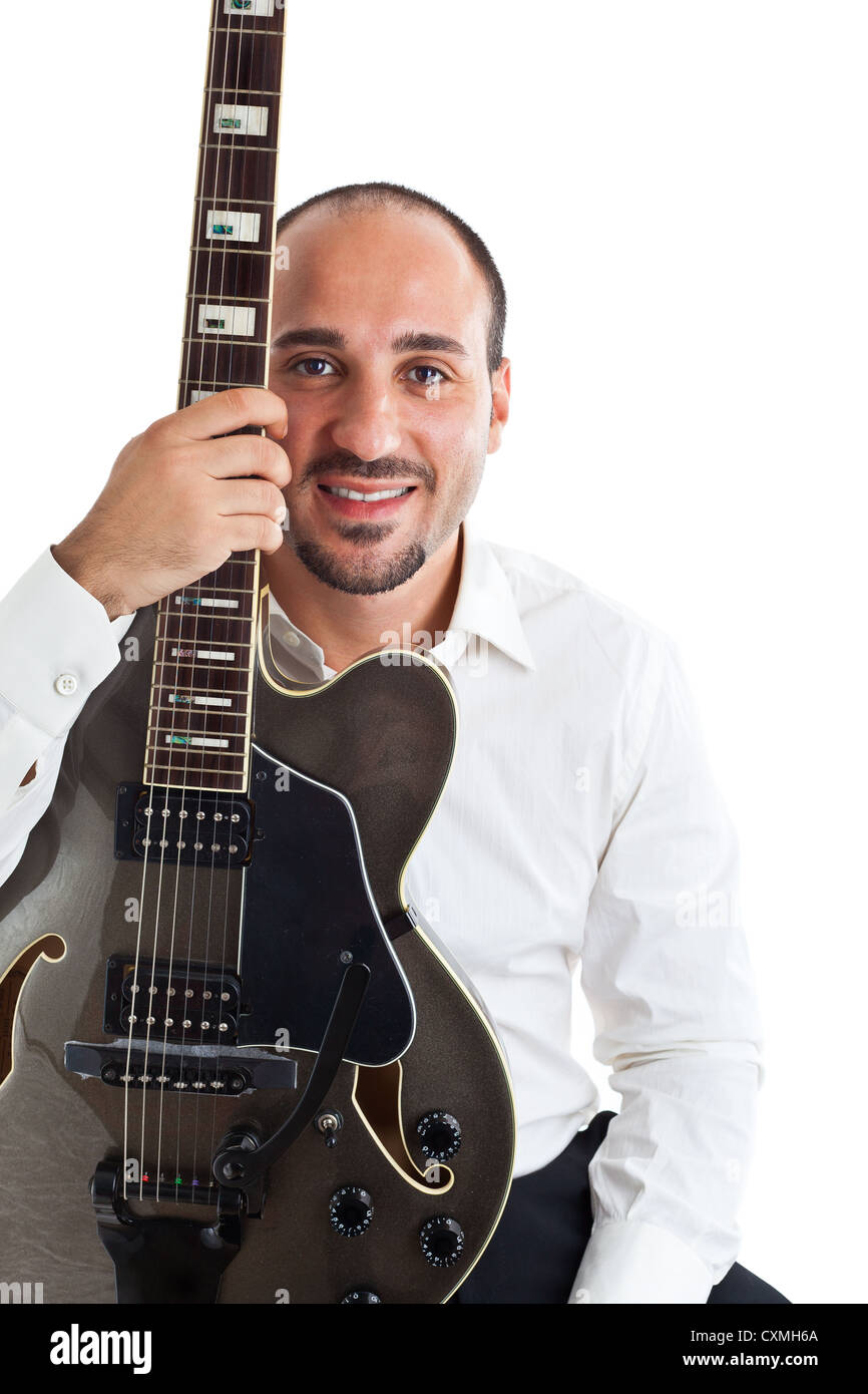 a well dressed jazz musician with a guitar Stock Photo - Alamy