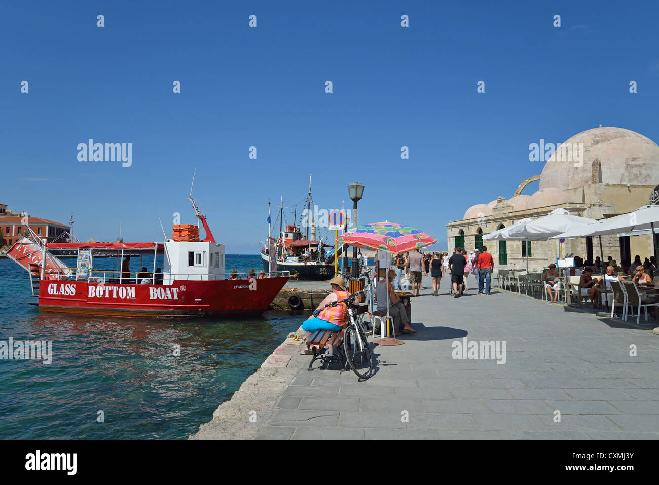 Glass bottom boat on seafront promenade, Chania, Chania Region, Crete ...