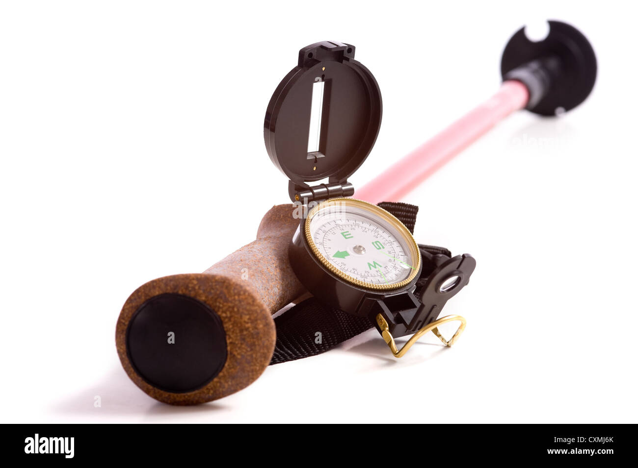 A compass and a hiking pole on a white background with copy space Stock ...