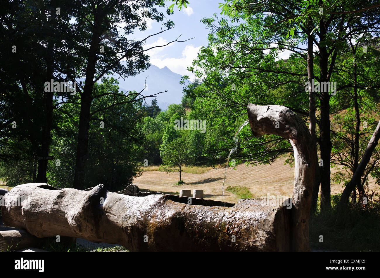 Alpine fountains in an italan alps Stock Photo - Alamy