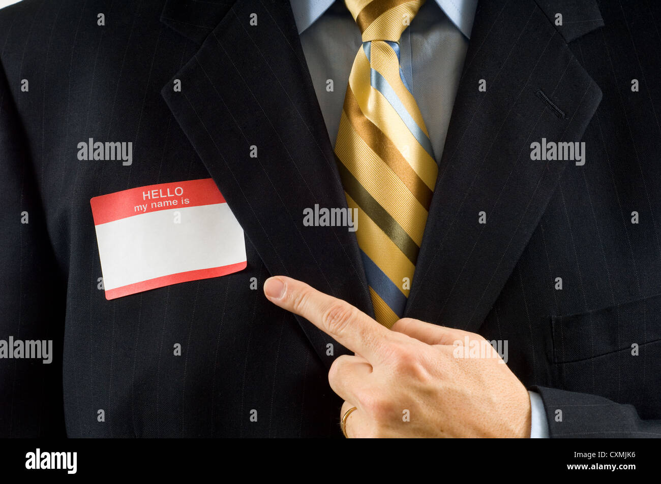 Business man in blue suit with name tag, insert your own text etc Stock ...