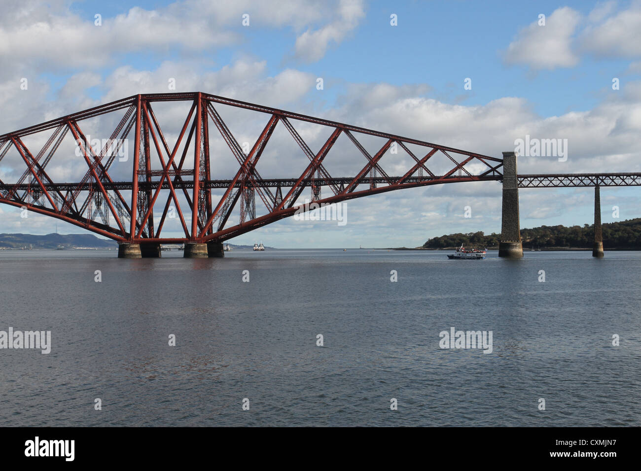 Maid of the Forth tour boat sailing by Forth Rail Bridge Scotland ...