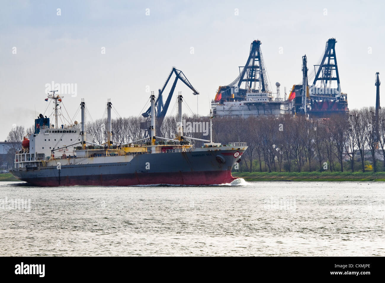 Semi-Submersible Crane Vessel Thialf in dock with ship in foreground on ...
