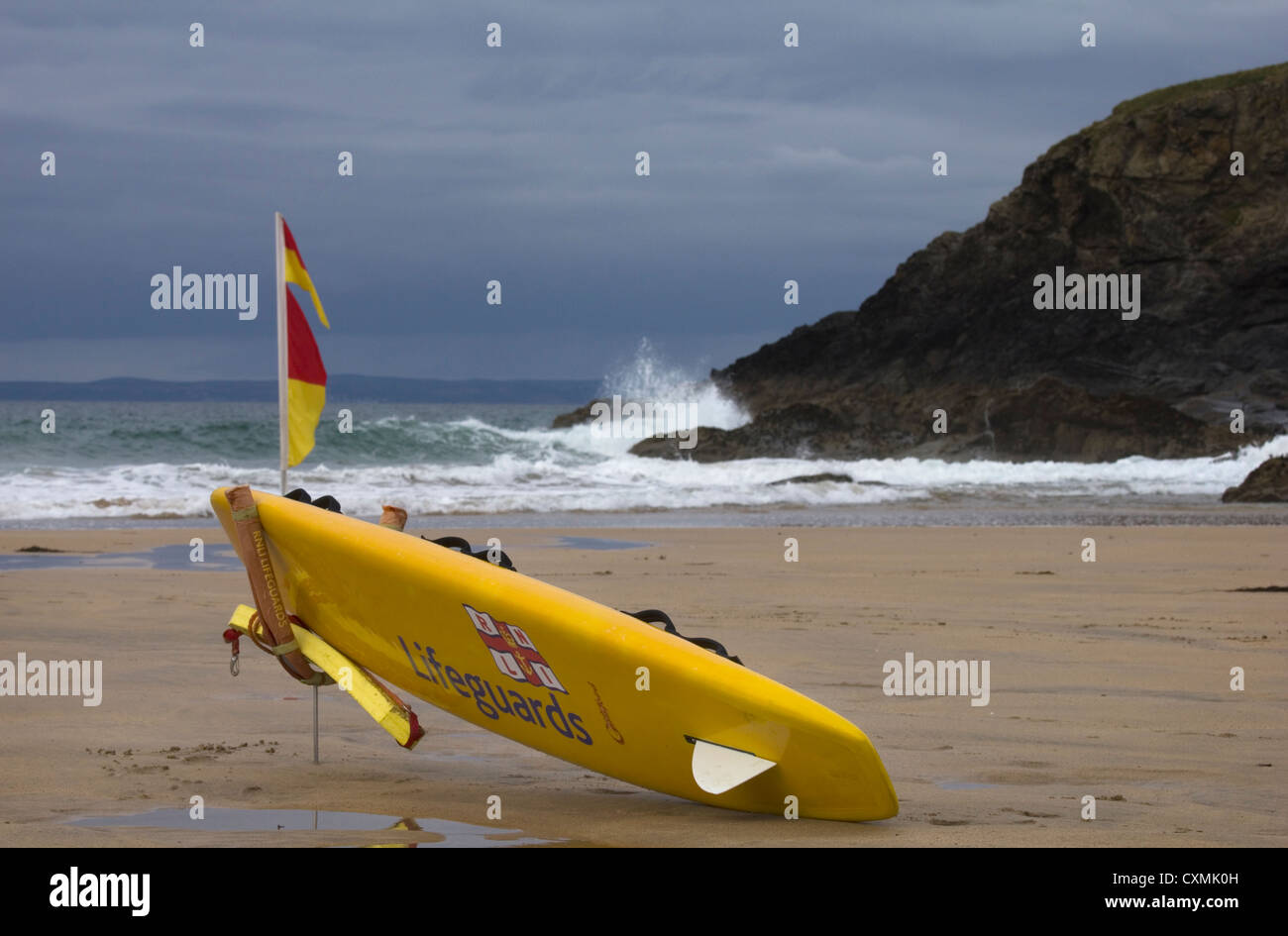 RNLI Royal National Lifeboat Institution lifeguard surf board at Poldhu ...