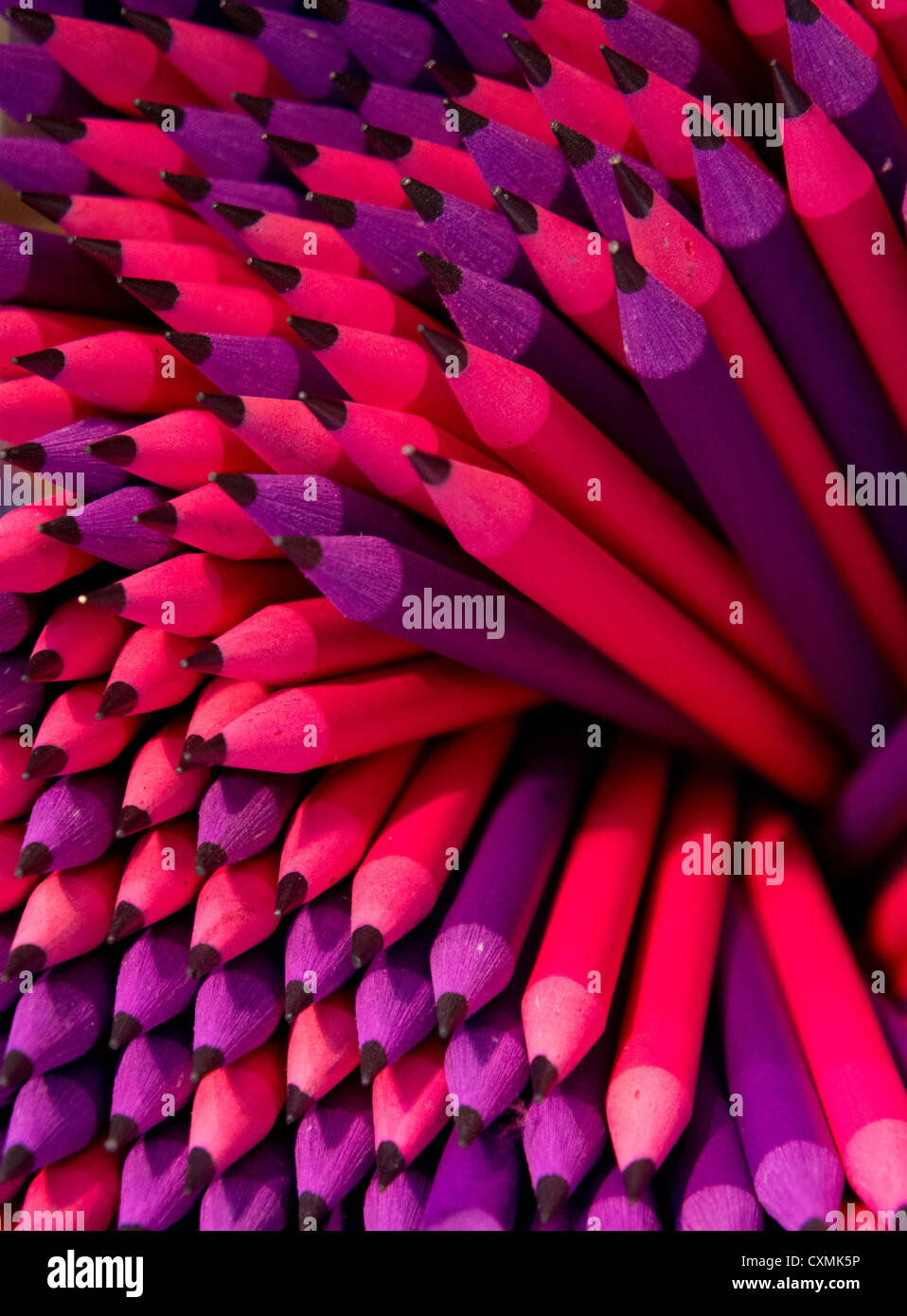 New, sharp purple and red pencils viewed from above Stock Photo - Alamy