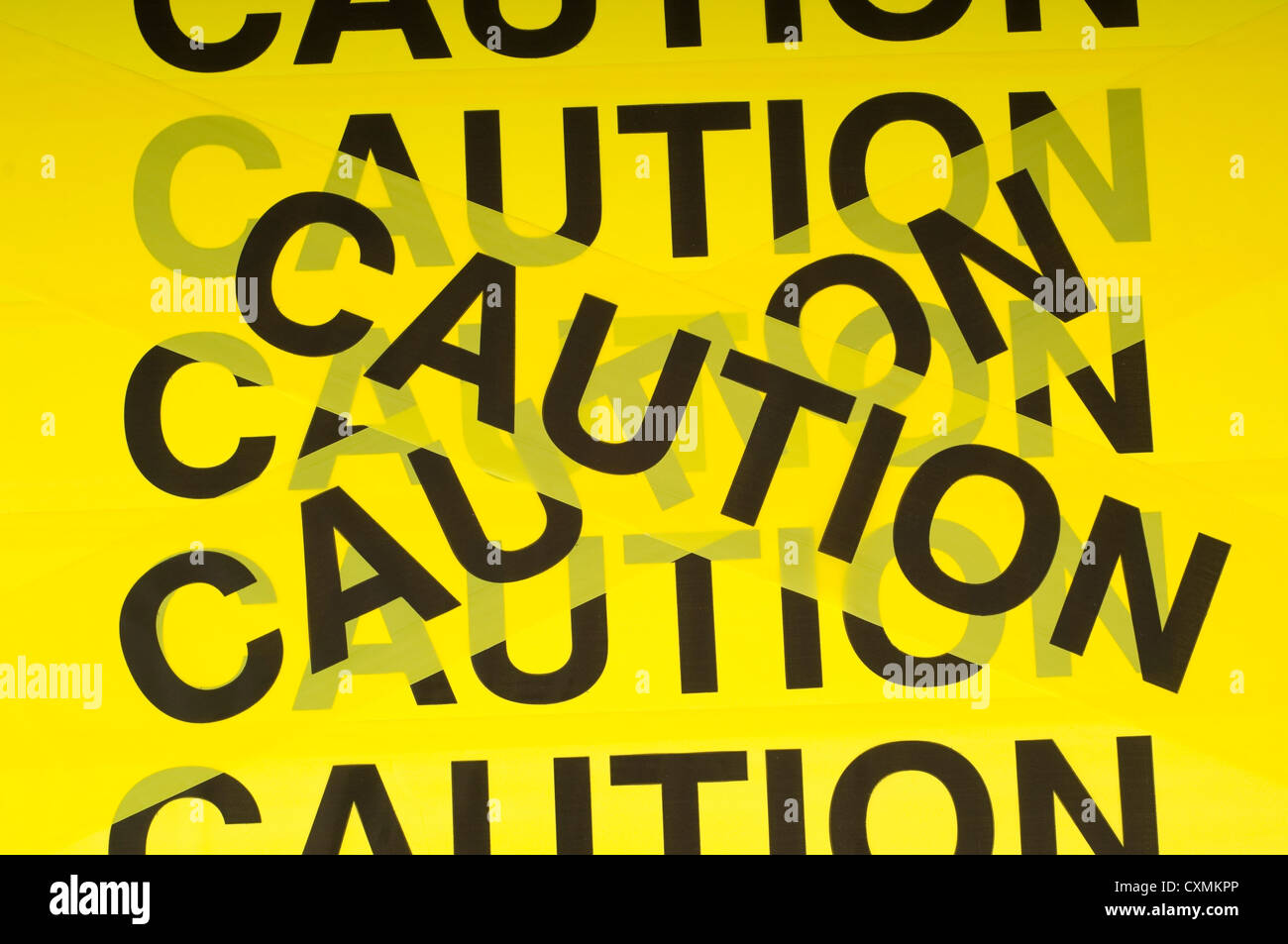 Yellow barrier tape with the word Caution, great background Stock Photo ...