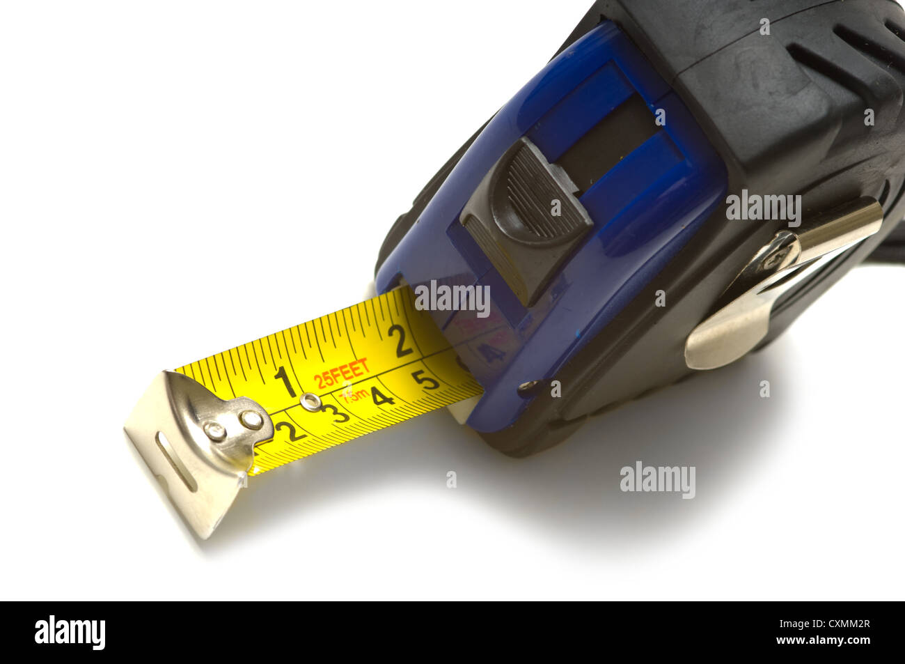 A yellow retractable tape measure on white background Stock Photo - Alamy