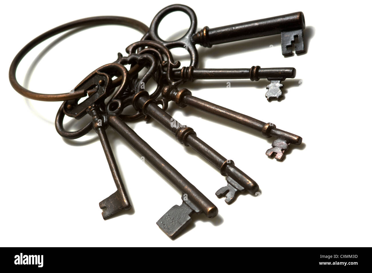 Set of antique, old fashioned keys or jailers keys on white background ...