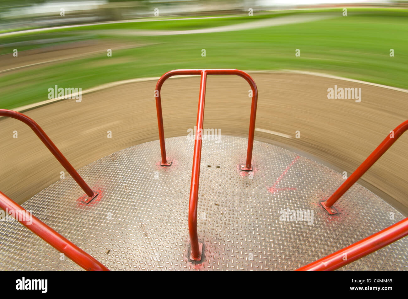 Children's Playground equipment - merry go round spinning very fast ...