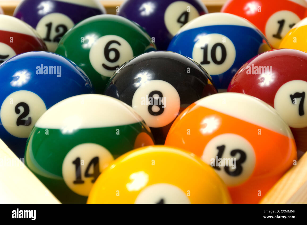 Brightly colored, new pool balls or billiard balls on white background ...