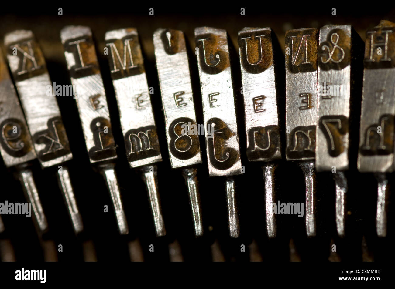 Old, rusty antique vintage typewriter keys on a black background Stock ...