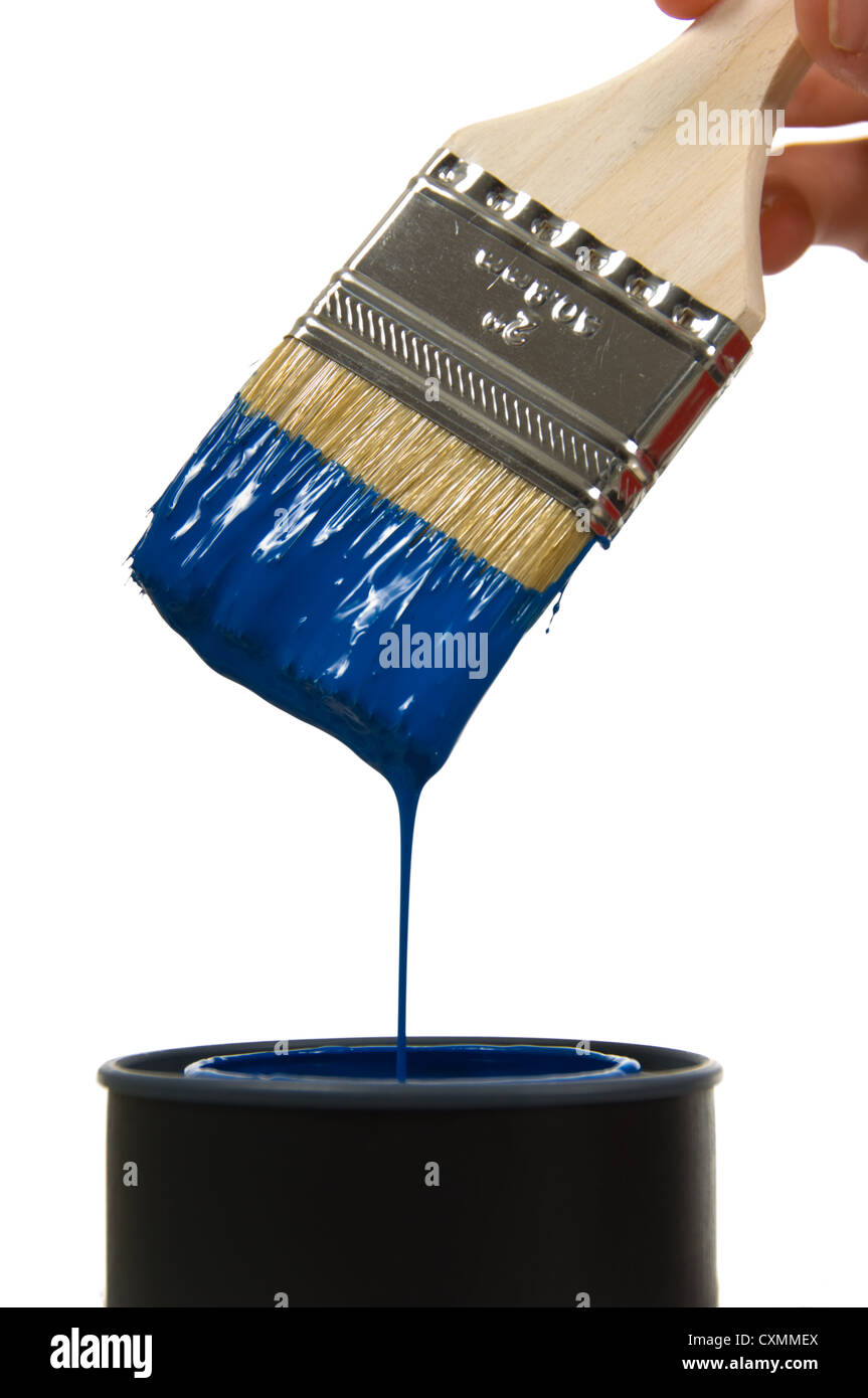 Dripping blue paint against a bright white background Stock Photo - Alamy