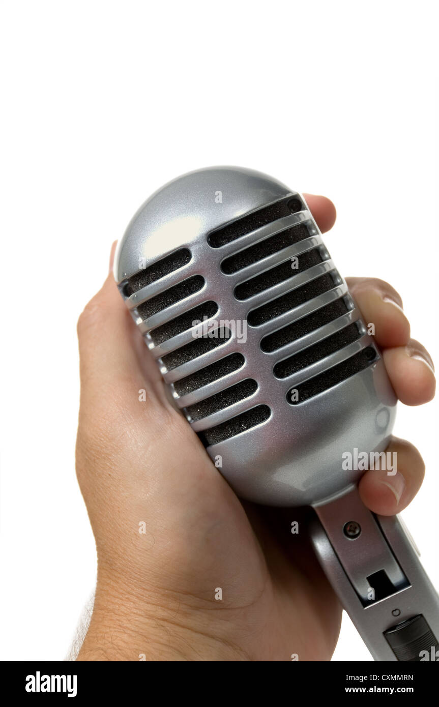 Vintage microphone on white background held in a man's hand Stock Photo ...