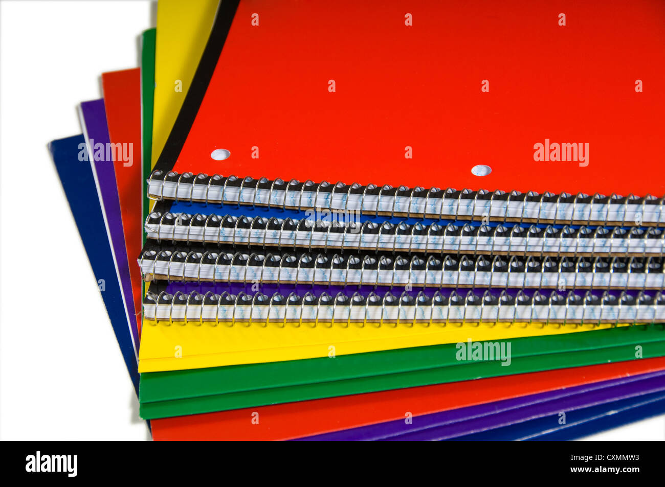 Stack of colorful school spiral notebooks on a white background Stock ...