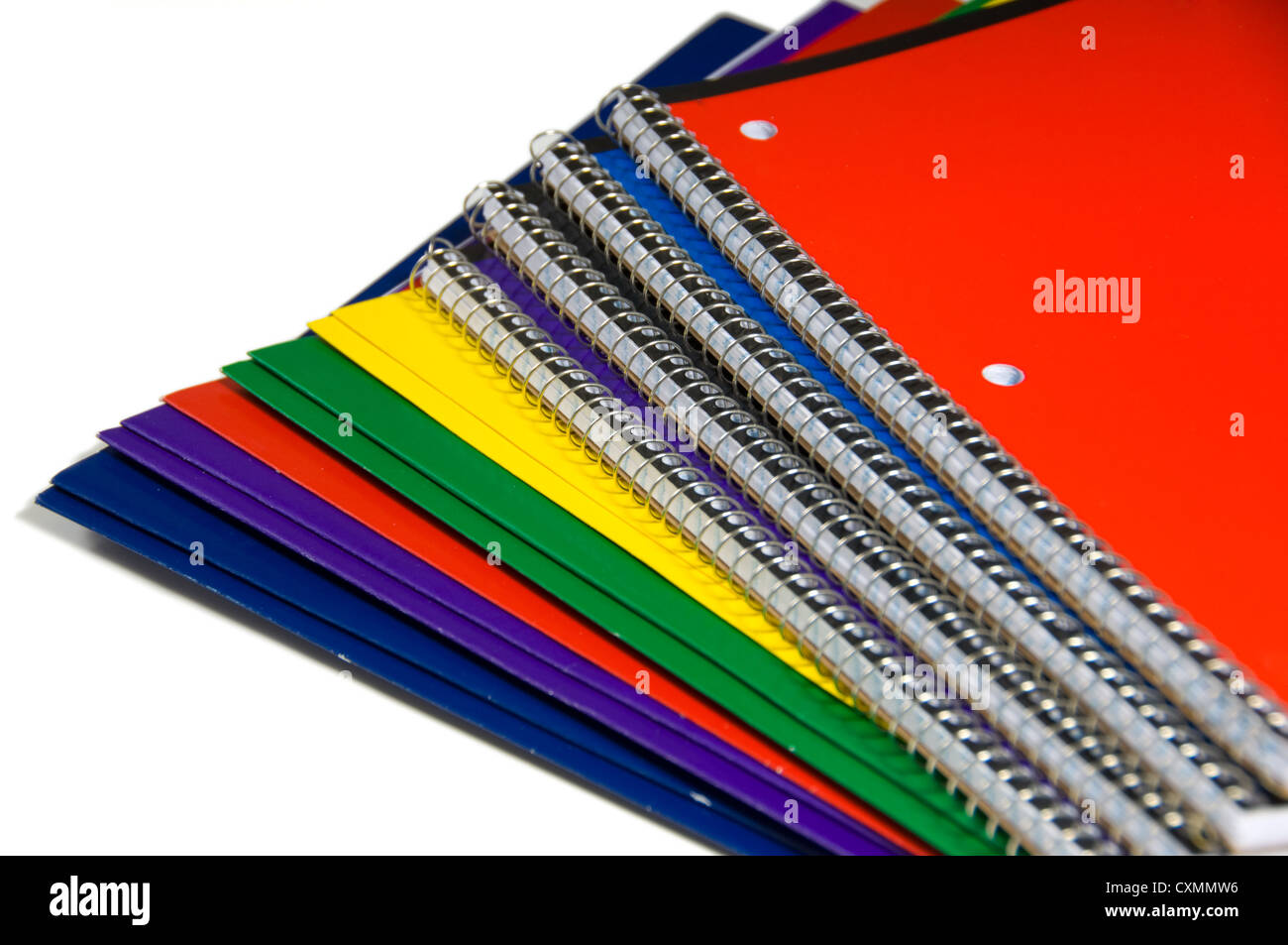 Stack of colorful school spiral notebooks on a white background Stock ...