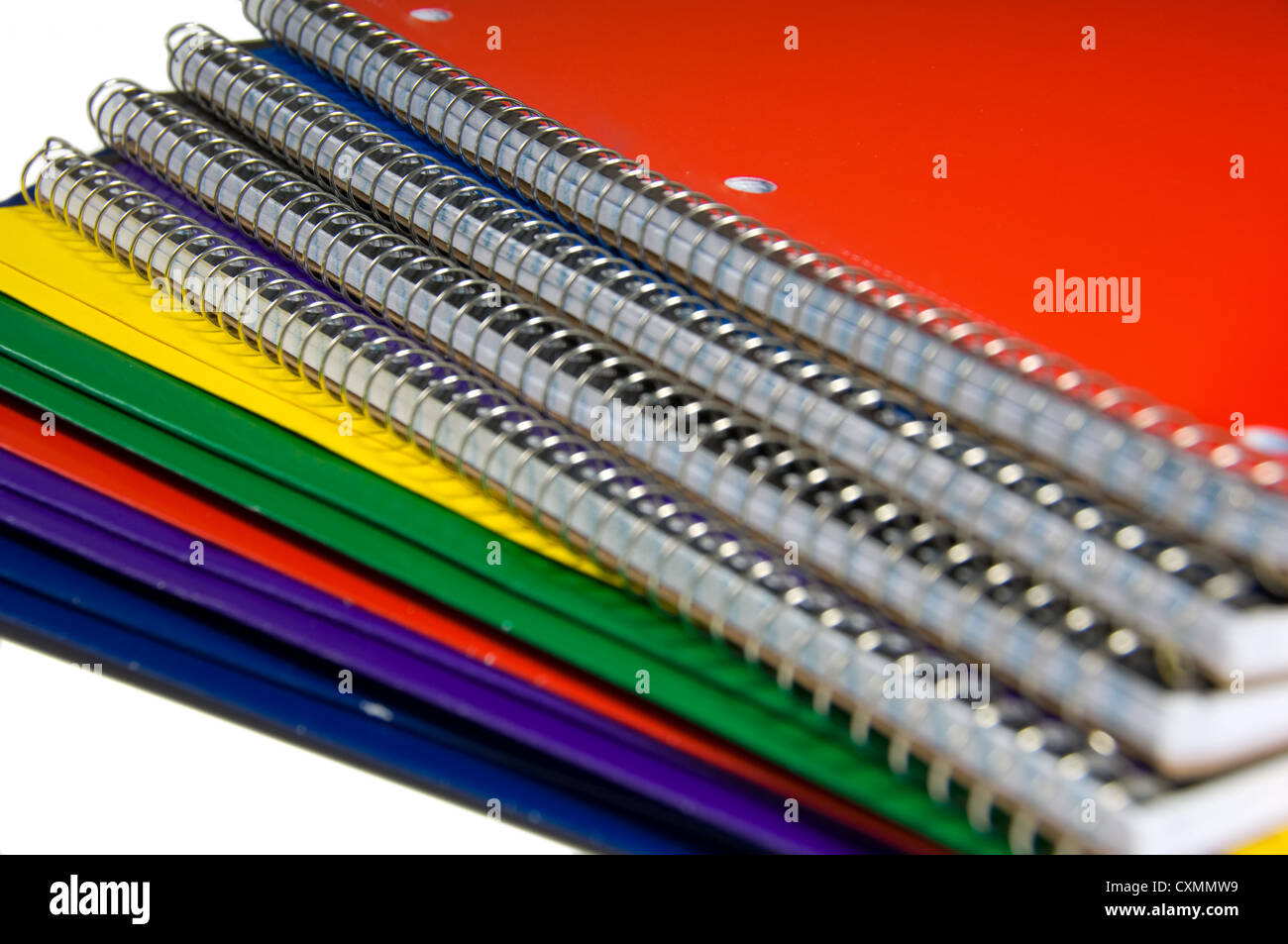 Stack of colorful school spiral notebooks on a white background Stock ...