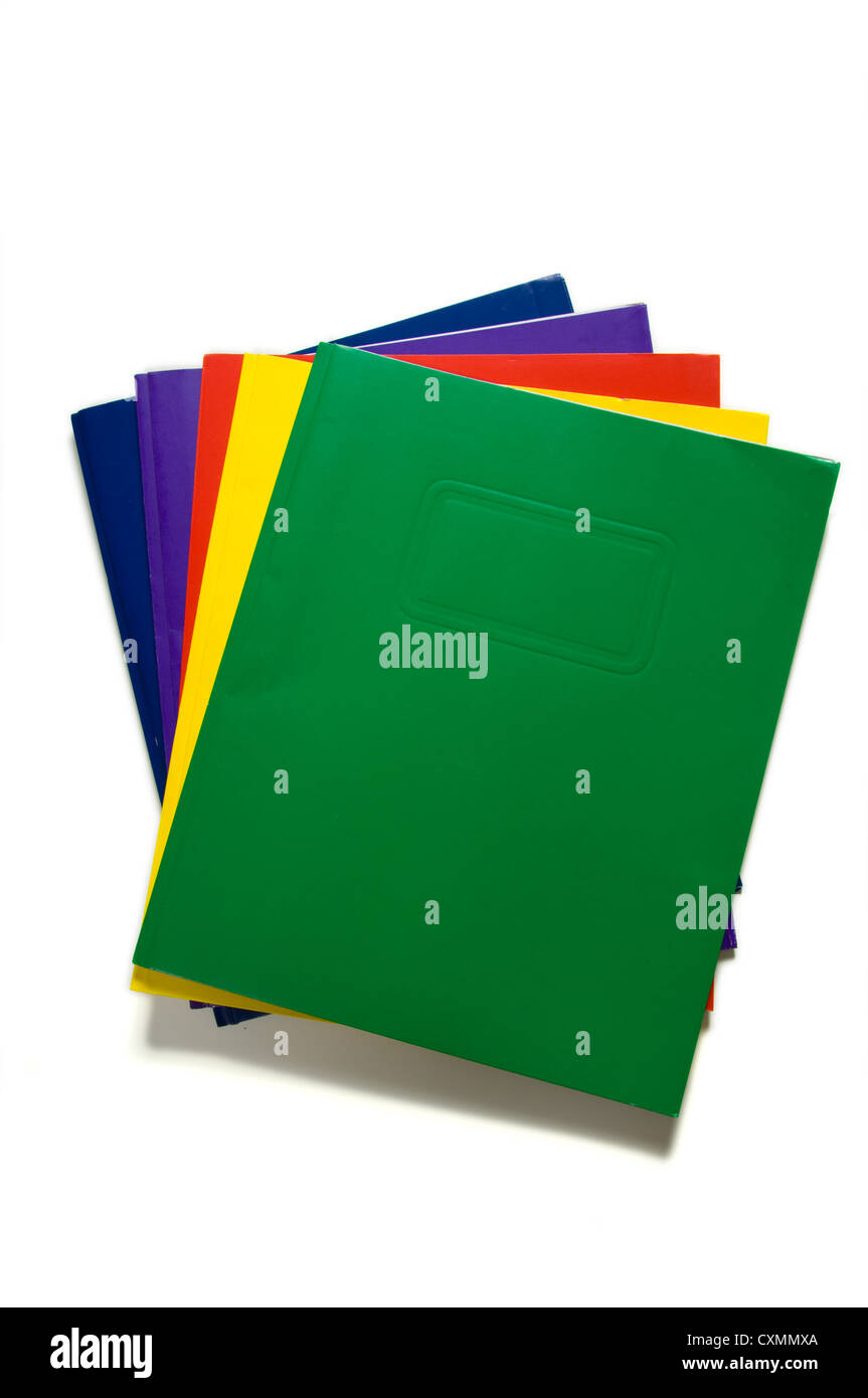 Stack of school folders in several colors on a white background Stock ...