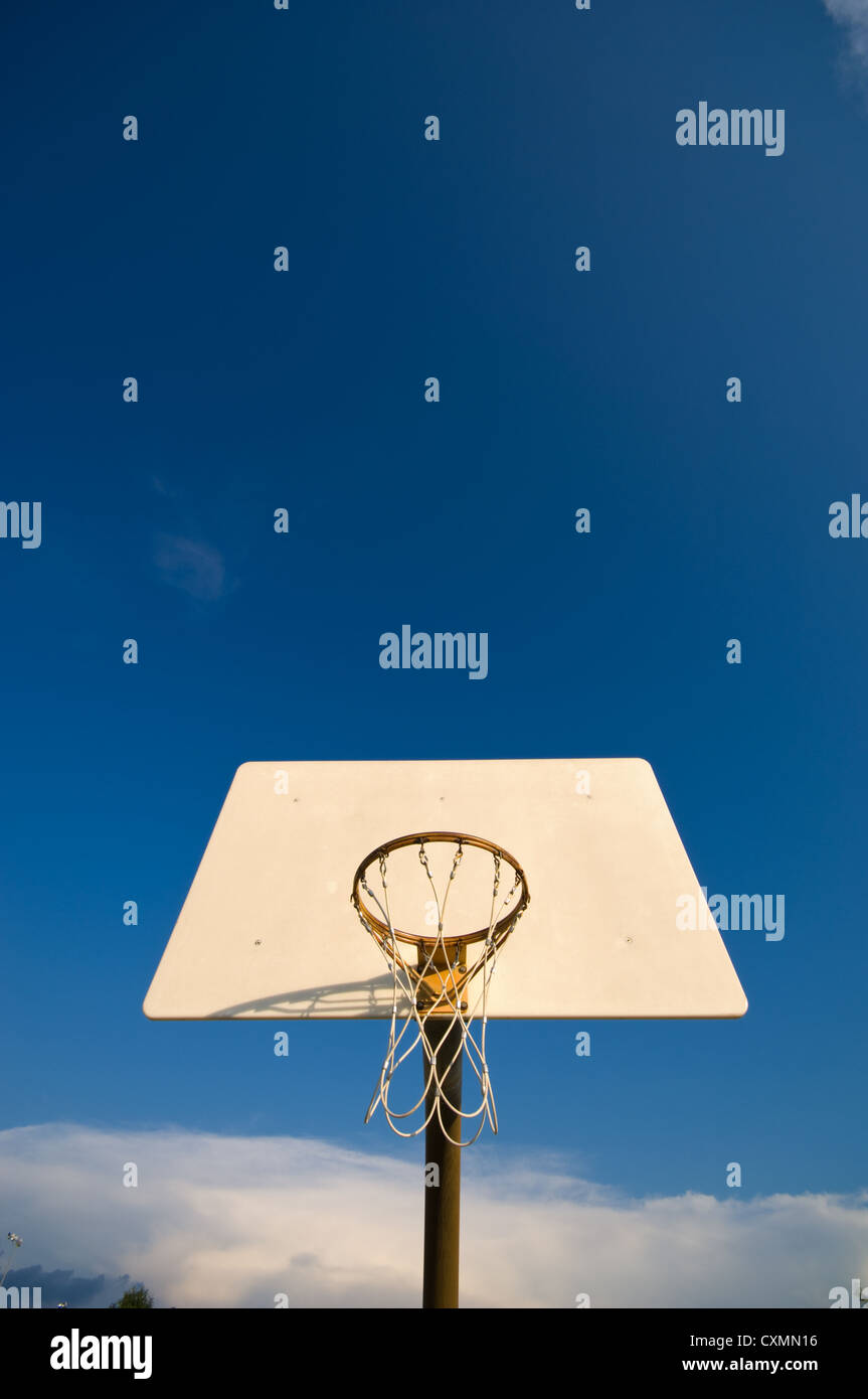 Basketball hoop with a sky blue background and copy space Stock Photo ...