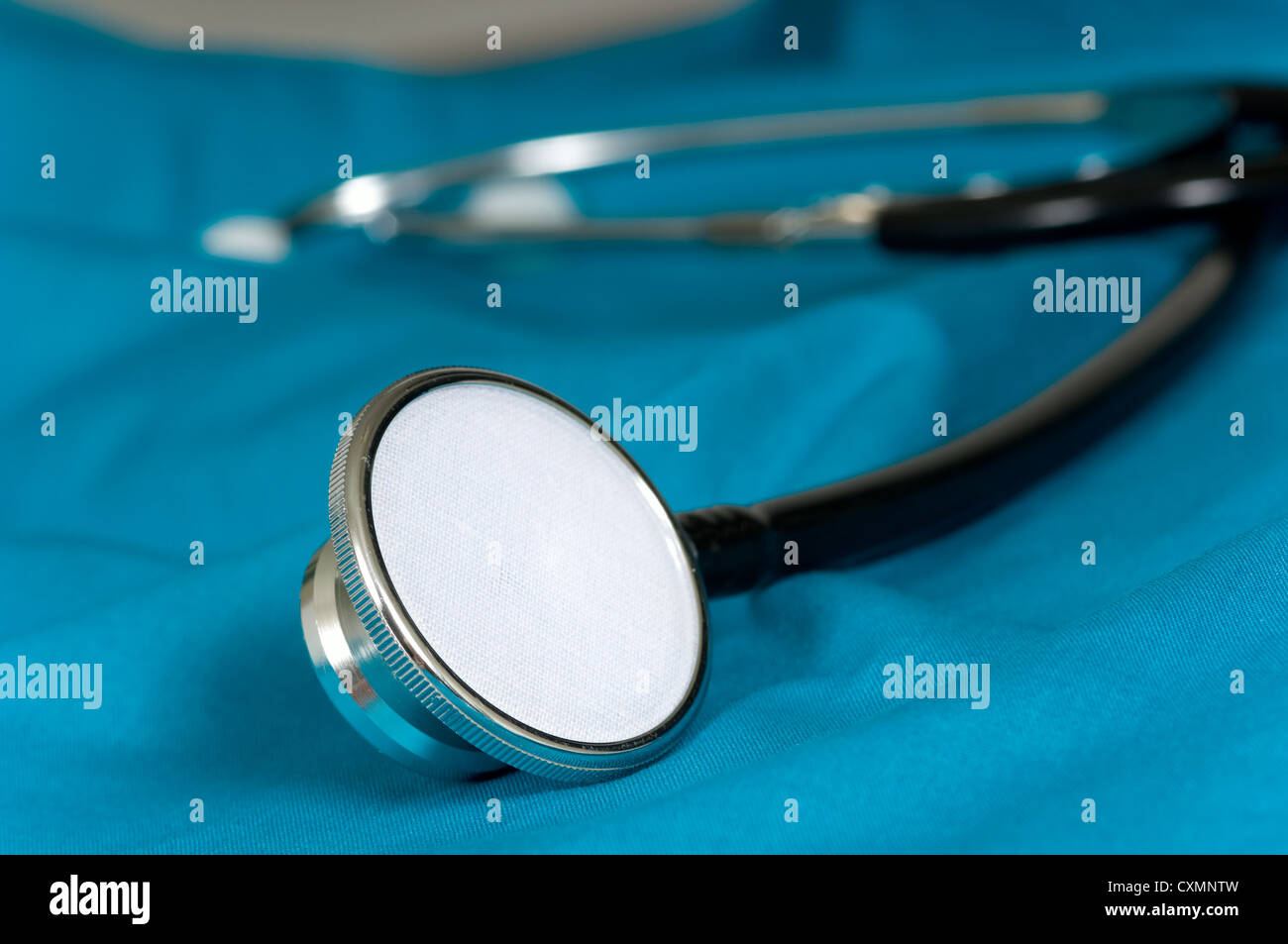 Doctor, physician or nurses stethoscope on greenish blue hospital ...