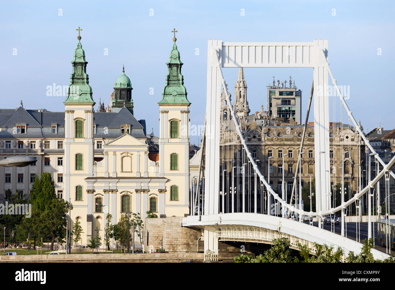 Inner City Parish Church and Elizabeth Bridge in Budapest, Hungary ...