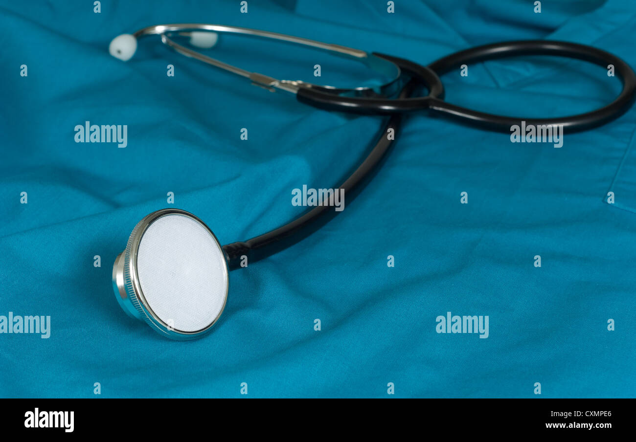 Doctor, physician or nurses stethoscope on greenish blue hospital ...
