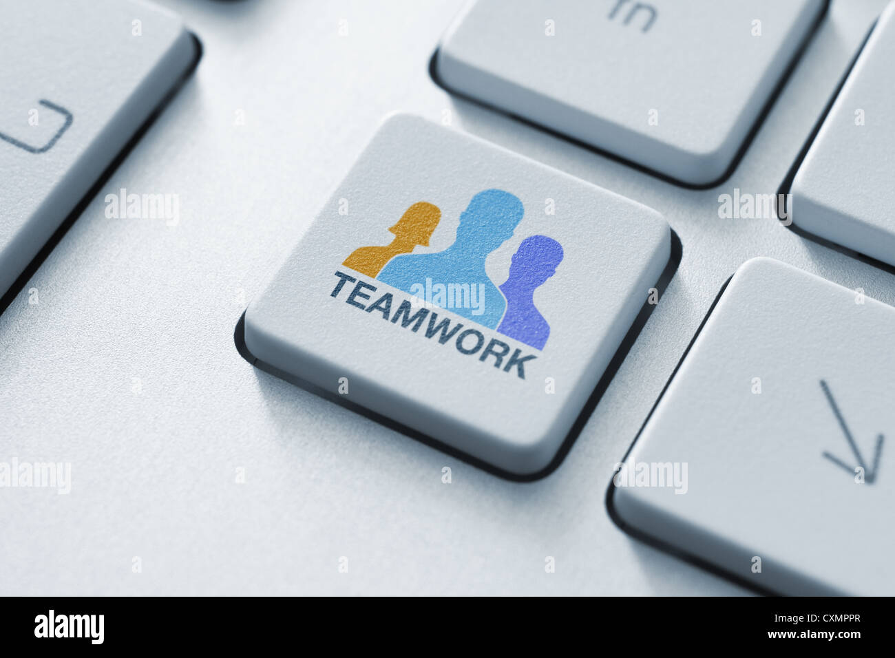 Teamwork key on keyboard concept. Toned image Stock Photo - Alamy